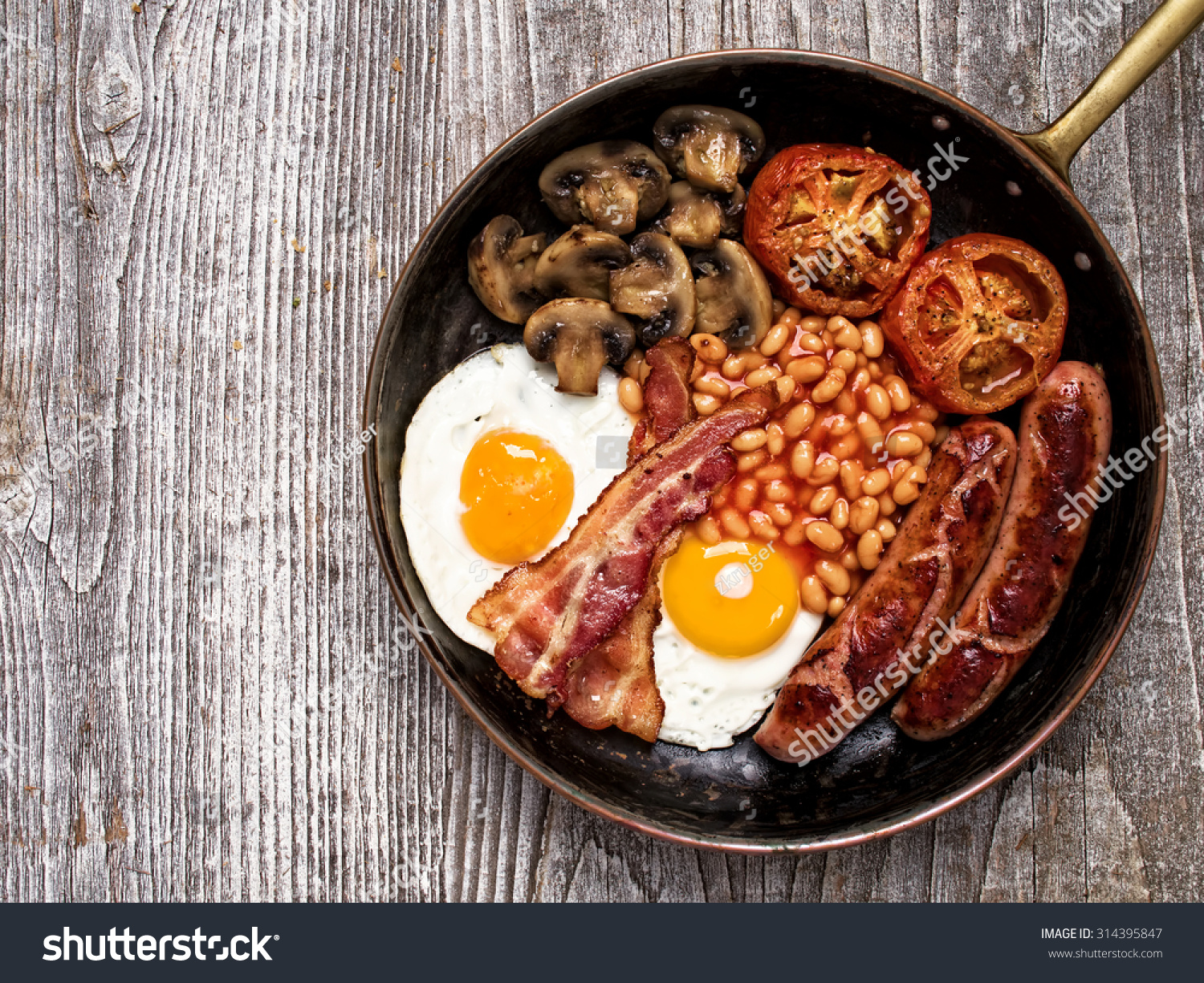 stock-photo-close-up-of-rustic-full-english-breakfast-314395847 - We-Do ...